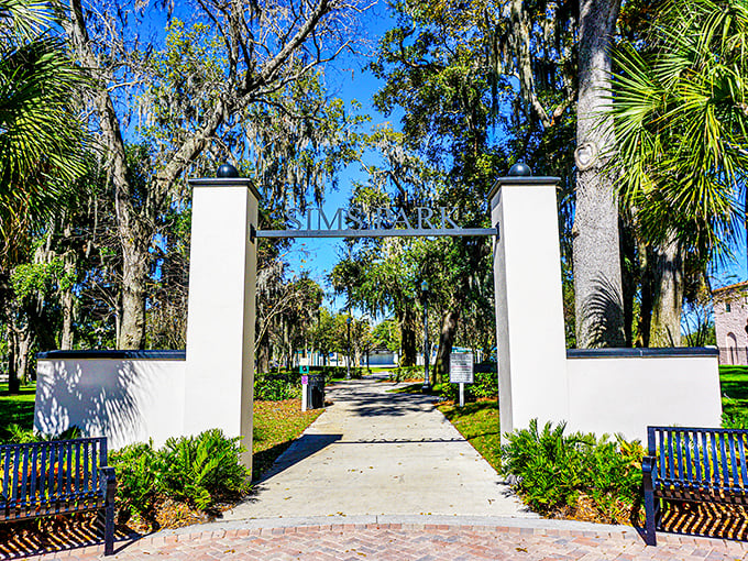 The gateway to Sims Park beckons with Spanish moss and sunshine. This community front yard hosts everything from concerts to contemplative afternoons.