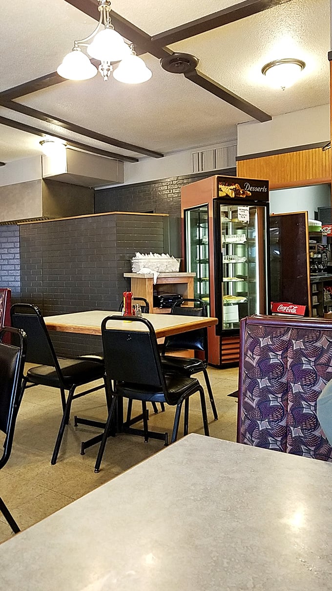 Simple wooden tables, unpretentious chairs, and that dessert case lurking in the background&mdash;Harvey's interior is the definition of "come as you are, leave fuller than you arrived."