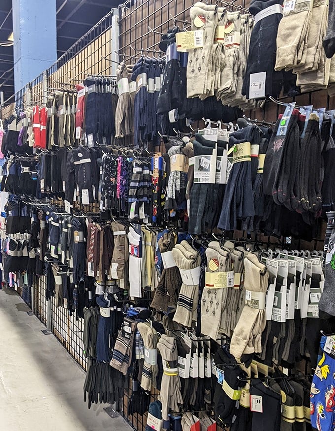 Sock heaven exists! This wall of perfectly organized footwear proves that sometimes life's greatest pleasures come in small packages &ndash; from business basics to whimsical patterns.