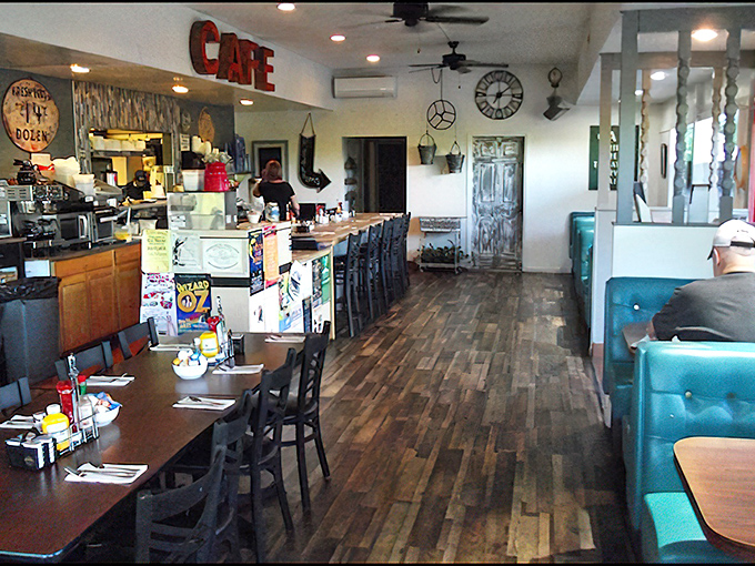 Wooden floors, turquoise booths, and counter seating create that perfect diner atmosphere where breakfast dreams come true and coffee cups never empty.
