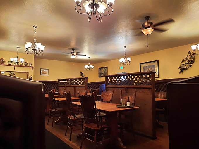 Step inside and you're transported to a world where wood paneling and lattice dividers create the perfect backdrop for serious steak consumption.