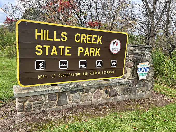 The classic welcome sign that promises adventure! Like finding the entrance to Narnia, but with better fishing opportunities and fewer talking lions.