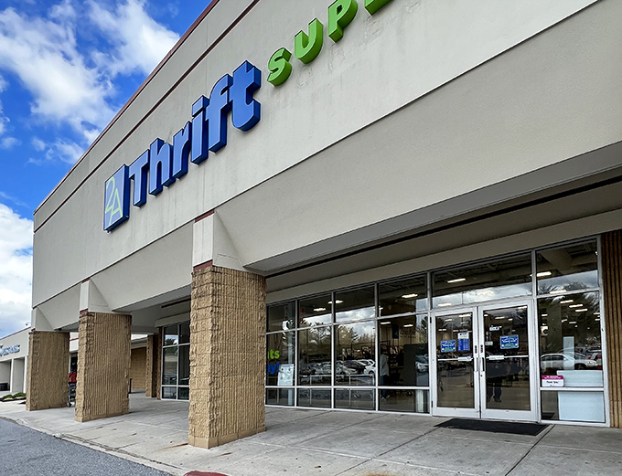 Blue skies and bargains await at the entrance to this thrifting paradise, where your wallet breathes a sigh of relief.