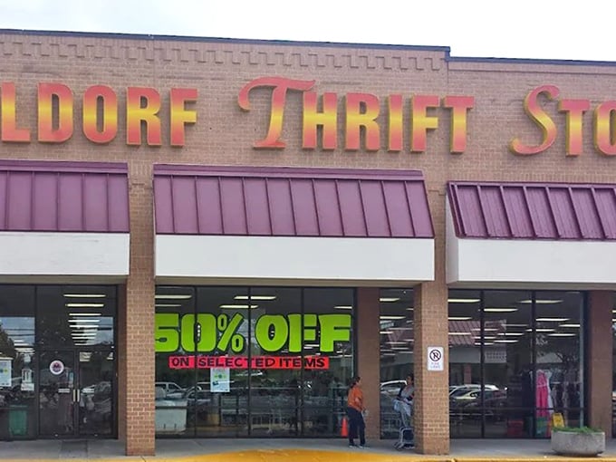 That neon "50% OFF" sign might as well say "Abandon all budget restraint, ye who enter here." The thrill of the hunt begins at the storefront. 