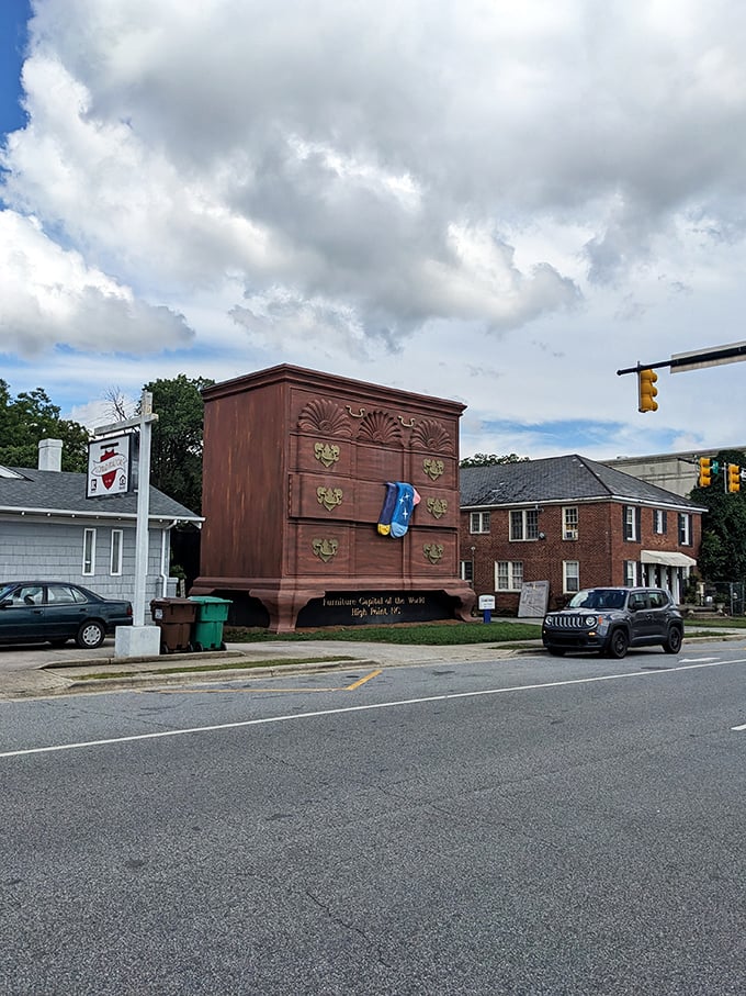 Just your average street corner in High Point, where the traffic lights compete with a towering bureau for attention. Honey, I think we need a bigger bedroom.