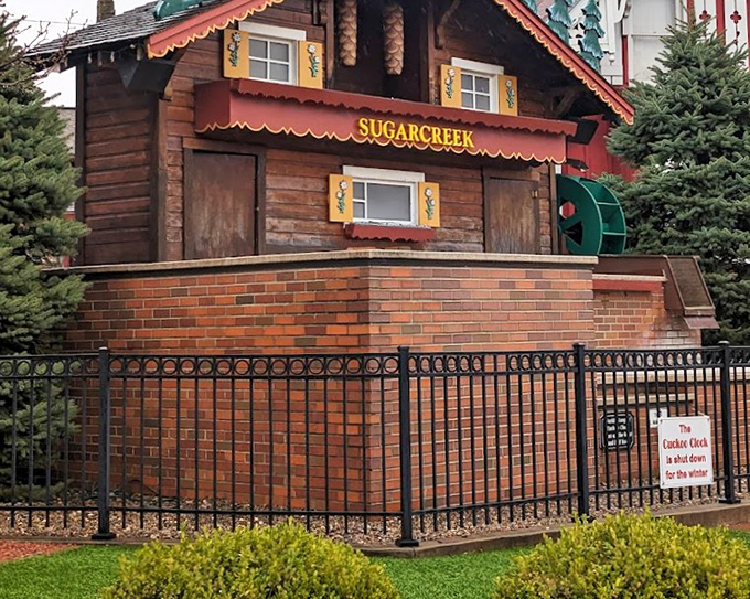 Nestled behind a wrought-iron fence, this oversized timepiece proves that sometimes the best attractions are the ones that make absolutely no practical sense.