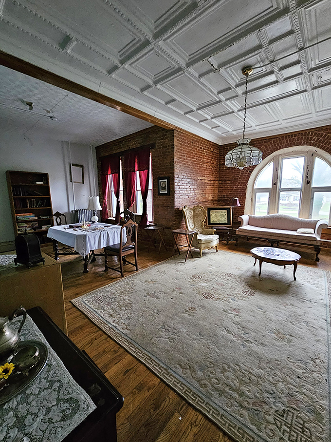 Elegant meets eerie in this parlor where time stands still. The ornate ceiling whispers stories of bygone eras to anyone brave enough to listen.