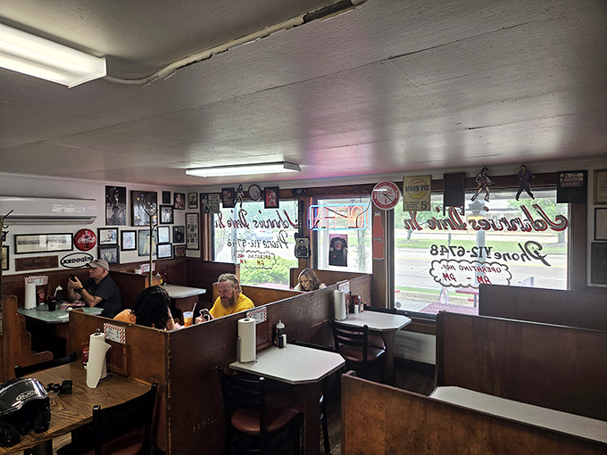 The interior feels like stepping into a time capsule&mdash;wooden booths worn smooth by decades of satisfied customers sharing stories over comfort food classics.