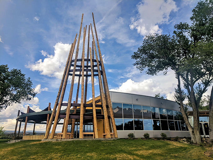 Not just poles reaching skyward, but a cultural bridge connecting past and present at the thoughtfully designed Ute Indian Museum.