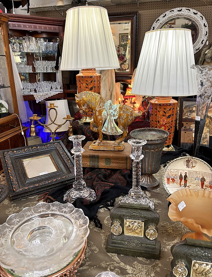 Crystal candlesticks and vintage lamps create vignettes that would make any decorator's heart skip a beat.