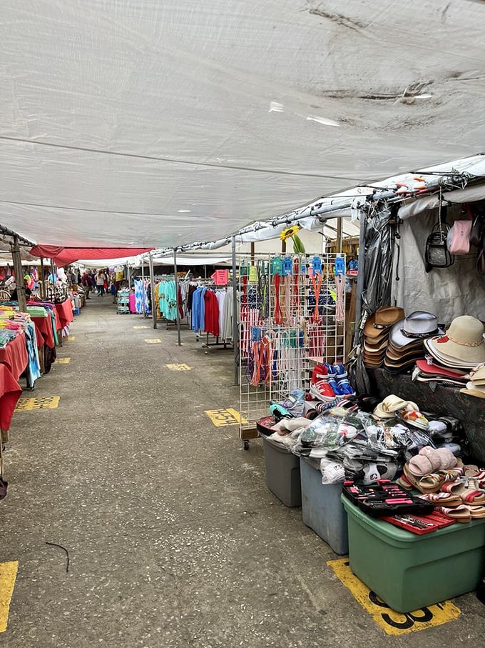 Fashion finds await under this covered walkway, where racks of clothing and accessories stretch as far as the eye can see. Treasure hunters, prepare yourselves!