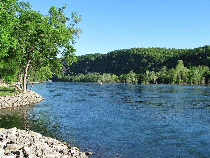 The White River flows with purpose, clear as a mountain spring and twice as inviting. Those rocky shores have heard more fish tales than a bait shop owner.