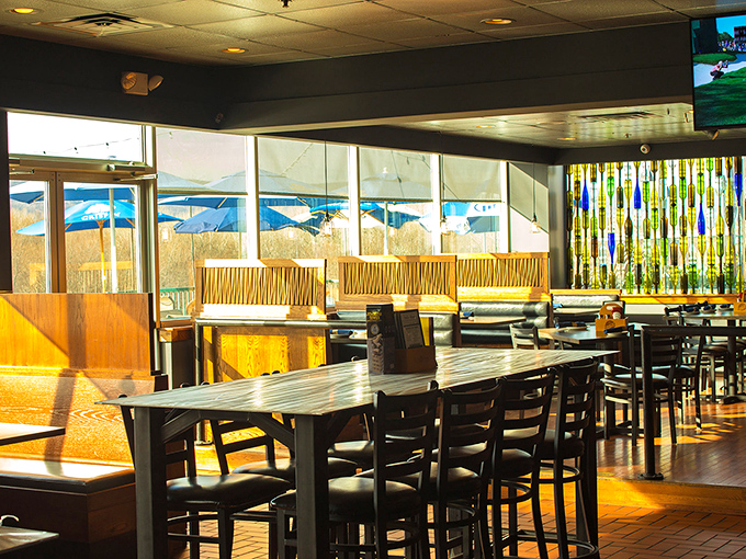 Sunlight streams through windows, casting a golden glow across wooden tables. This isn't just dining&mdash;it's dinner theater with comfort as the star.