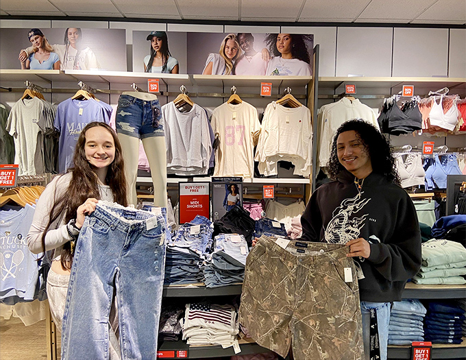 Shopping joy captured in real time! These happy shoppers show off their fashion finds, proving that style doesn't have to break the bank.