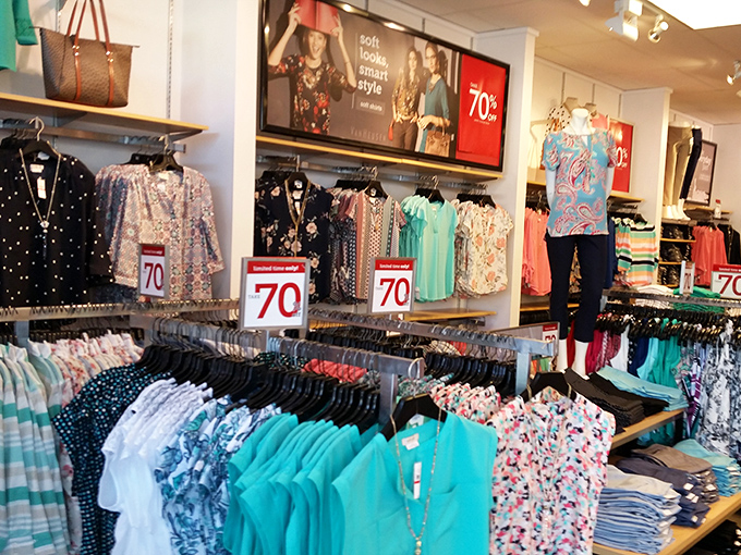 Racks on racks of possibility. Those 70% off signs aren't just numbers&mdash;they're permission slips for guilt-free retail therapy.