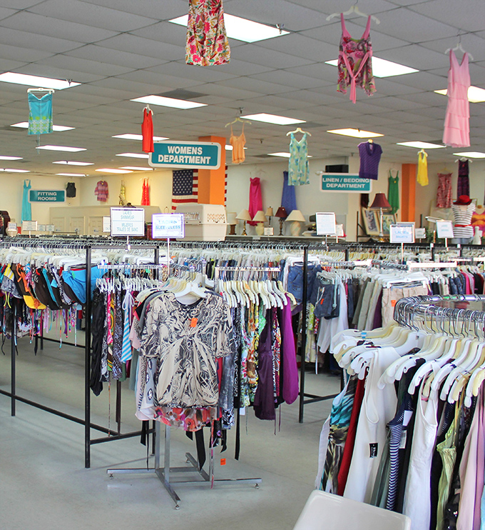 Colorful garments dance from the ceiling in the women's department, creating a textile rainbow that makes shopping feel like a carnival of fashion finds. 