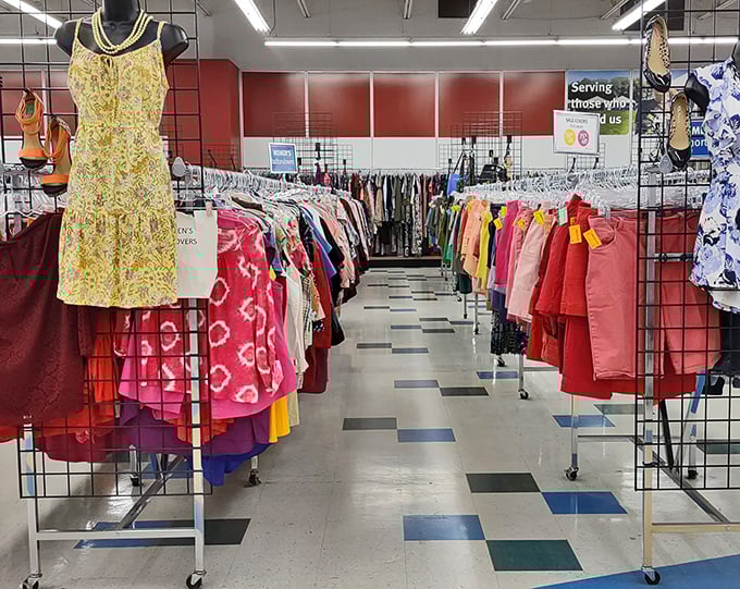 Color-coded clothing racks create a rainbow road to fashion freedom. That yellow sundress might just be your next summer statement piece.