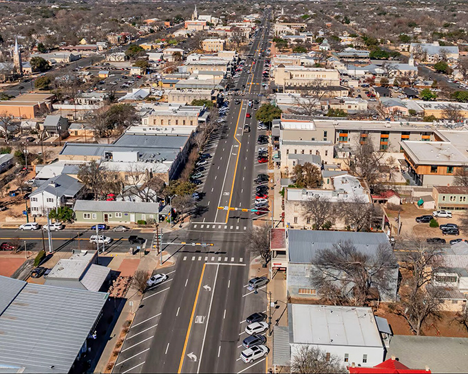 From above, Fredericksburg's grid layout reveals itself&mdash;a masterpiece of German precision nestled in the rolling Texas Hill Country.