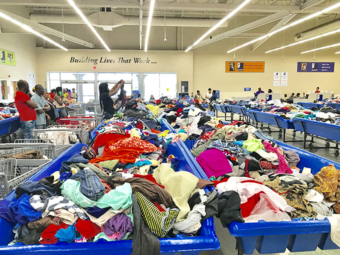 Mountains of possibility in every bin. Like archaeological digs for fashion enthusiasts, each layer reveals potential gems waiting to be discovered.