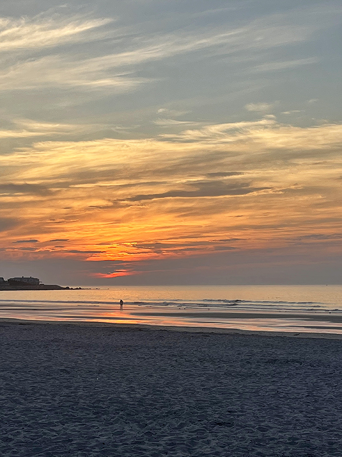 Mother Nature showing off again with a sunset that turns Rye's shoreline into a watercolor masterpiece. Worth every minute of the wait.