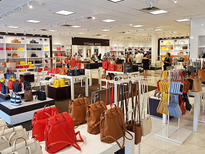 Michael Kors handbag heaven &ndash; where resistance is futile and "just browsing" becomes "I'll take three." Every color imaginable awaits your next fashion commitment.