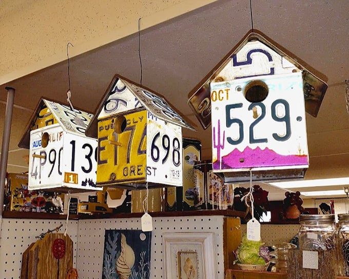 License plates reborn as whimsical birdhouses&mdash;proof that yesterday's road trip might become tomorrow's garden centerpiece.