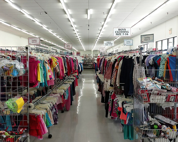 Racks upon colorful racks of clothing stretch toward the horizon, a textile ocean where last season's castoffs become tomorrow's fashion statements.
