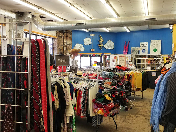 A rainbow of possibilities hangs on the racks, where yesterday's fashion finds new life and new owners in this organized chaos.