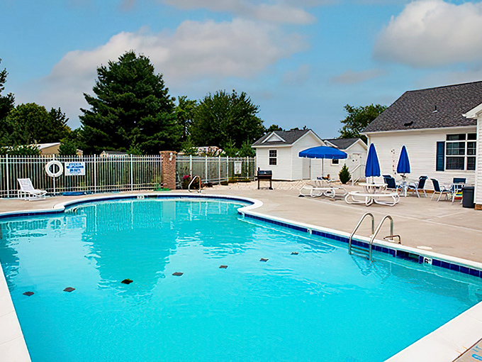 The community pool&mdash;where morning lap swimmers and afternoon socializers create the unofficial heart of Southern Meadow's social calendar.