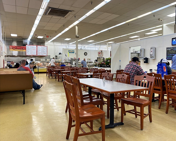 The market's dining area offers a perfect pit stop for weary treasure hunters. Those wooden chairs have heard more bargaining stories than an Antiques Roadshow marathon.