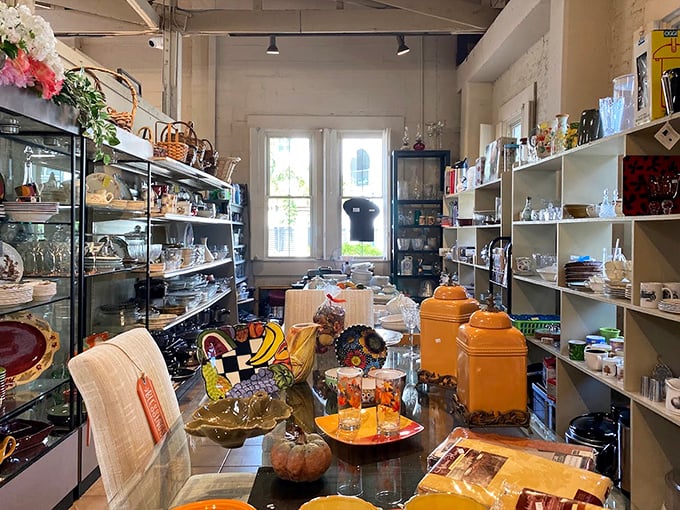 Shelves packed with vintage dinnerware tell stories of family gatherings past. That holly-patterned teacup? Someone's grandmother definitely served holiday cookies with it.