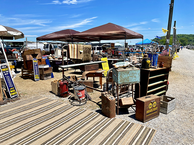 Rustic tents shelter the past – vintage thermometers, weathered crates, and metal signs that whisper stories from America's industrial heyday.