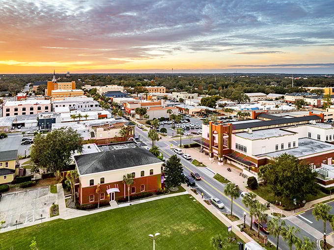 Sunset paints Leesburg's skyline in watercolor hues that would make Bob Ross reach for his palette. No happy little accidents here, just pure Florida beauty.