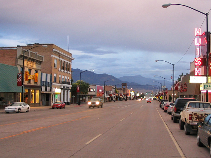 As dusk settles over Richfield, the neon signs begin their gentle glow &ndash; nature's sunset and human ingenuity performing their nightly duet. 