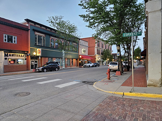 As evening settles on Commercial Street, the brick-paved sidewalks and colorful storefronts create the kind of Main Street that Norman Rockwell would have rushed to paint.