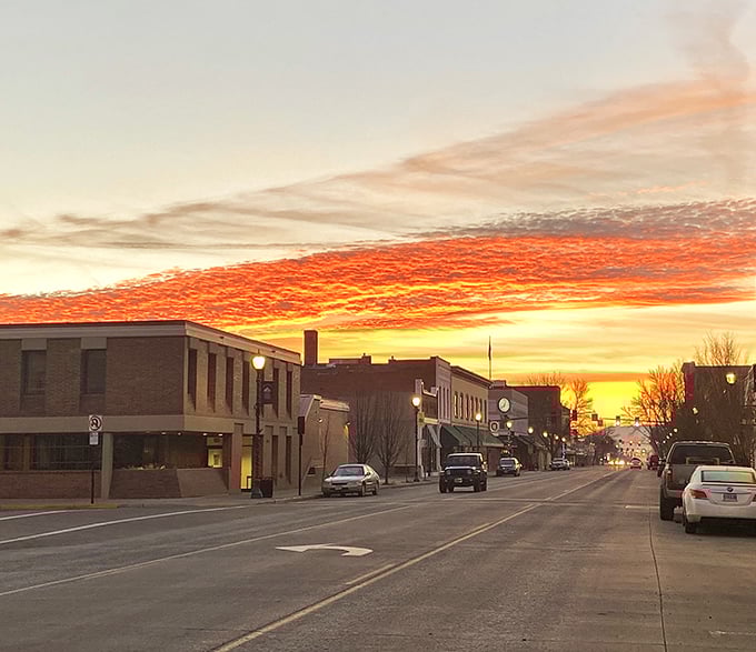 Sunset paints the sky in shades that would make Bob Ross reach for new adjectives &ndash; nature's own welcome sign over La Grande's historic streets.