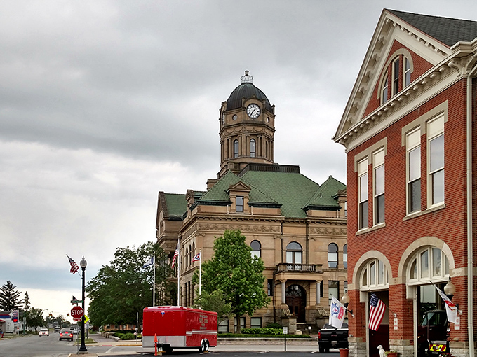 The Auglaize County Courthouse stands as Wapakoneta's crown jewel, its stately clock tower keeping time for generations of townsfolk below.
