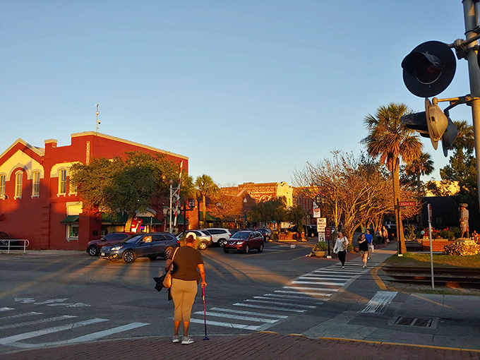 Golden hour transforms downtown Fernandina into a Norman Rockwell painting with palm trees. Even the crosswalks feel like they're from another era.