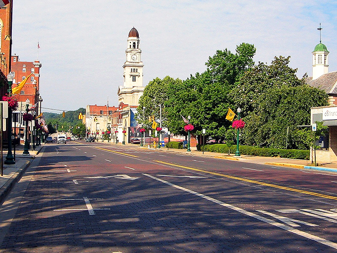 The iconic clock tower stands sentinel over Marietta's tree-lined streets, a postcard-perfect scene that Norman Rockwell would have rushed to paint.