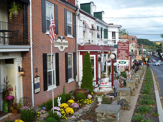 Stroll down these brick-lined sidewalks past the Stephan House Inn, where flowering gardens and historic architecture create postcard-worthy moments at every turn.