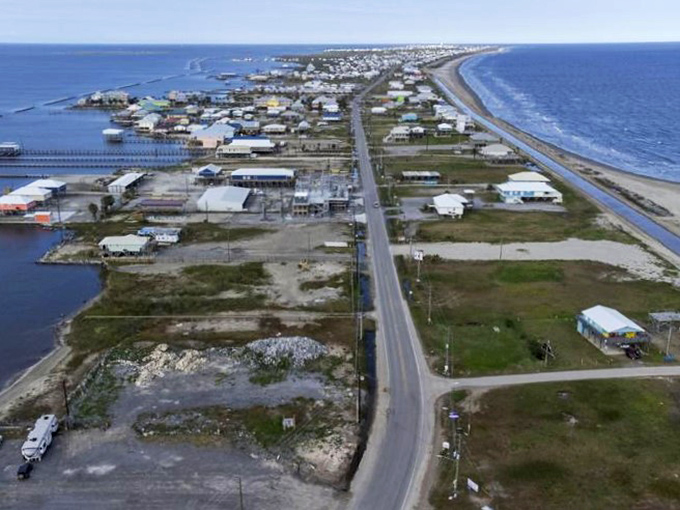 The main strip shows off Grand Isle's laid-back charm, where elevated homes stand ready for whatever weather comes their way.