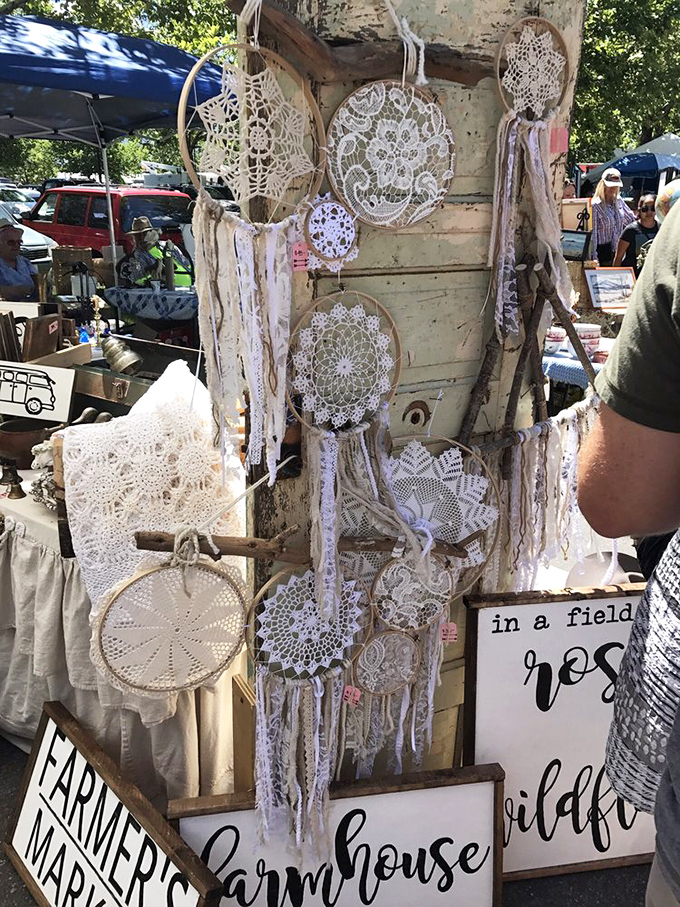 Delicate dreamcatchers dance in the breeze, their intricate lacework telling stories of craftsmanship that Instagram filters simply can't capture.
