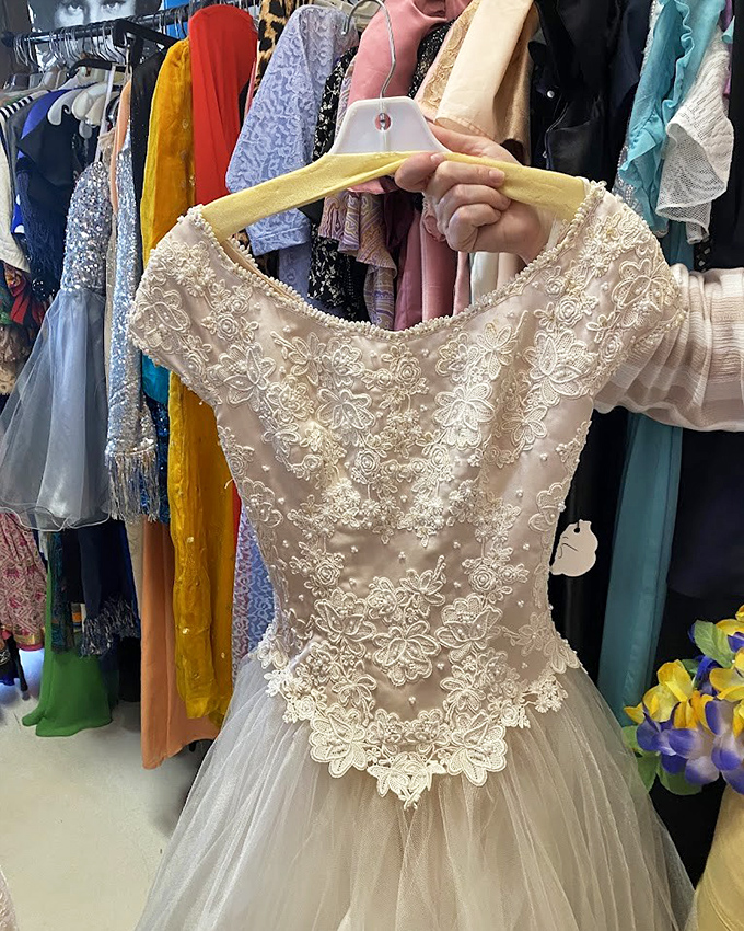 Delicate beadwork and ethereal tulle&mdash;wedding dresses from bygone eras hang like ghosts of celebrations past, waiting for their next dance.