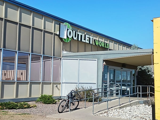 Welcome to the gateway of possibility! The entrance to Outlet World promises adventure with its no-frills facade and wheelchair-accessible approach.