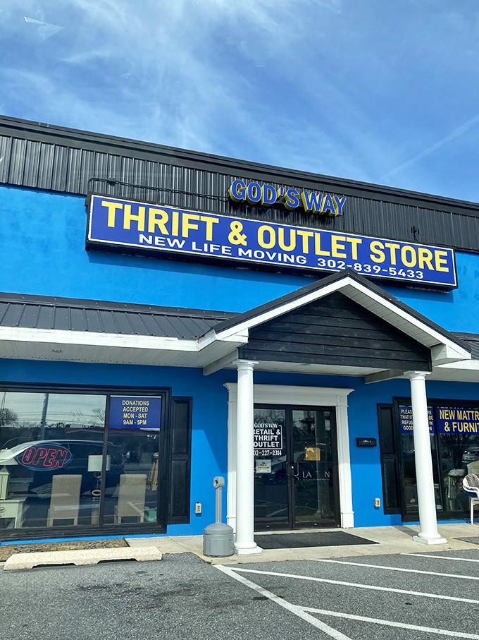 Step through these doors and leave your full-price shopping habits behind. The blue facade and welcoming entrance promise adventures in affordable retail therapy.