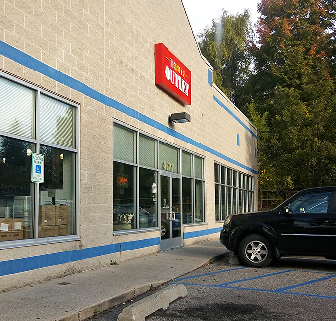 That iconic red sign beckons like a lighthouse for the budget-conscious shopper. Step through these doors and enter the magical realm of markdown merchandise.