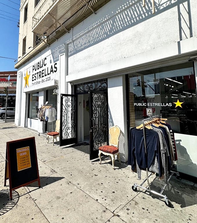 The entrance beckons with ornate iron doors and sidewalk racks&mdash;a siren call to bargain hunters and vintage enthusiasts alike.