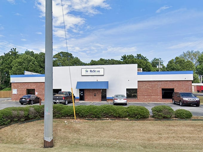 Blue skies and blue trim frame this suburban secondhand paradise. The parking lot is often full of treasure hunters and donation drop-offs.