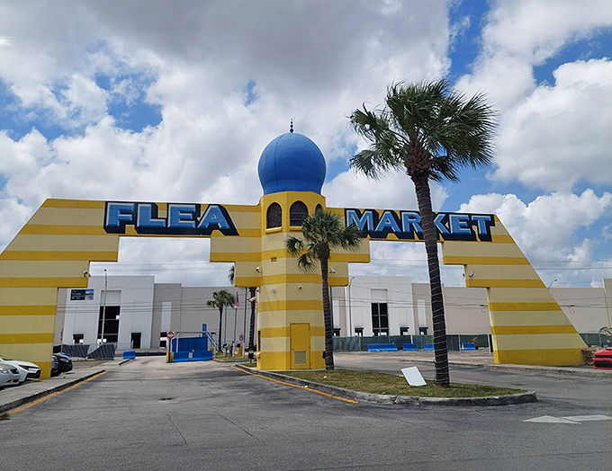 The iconic yellow-striped entrance with its blue dome stands as South Florida's bargain Taj Mahal. Palm trees included at no extra charge.