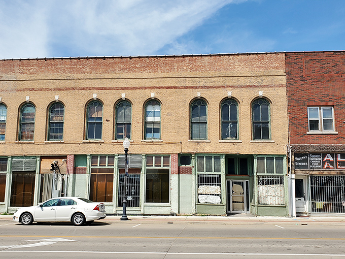 Historic brick architecture houses countless memories within. Downtown Warrensburg's charm sets the perfect stage for this journey into America's material past.